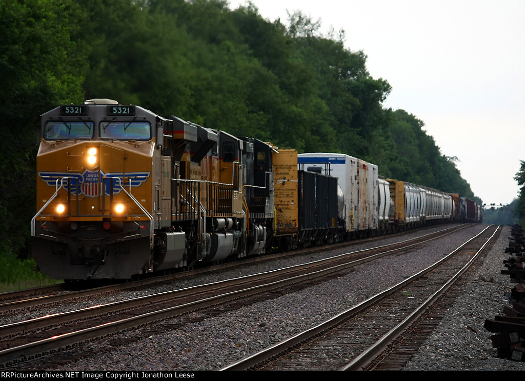 UP 5321 leads a mixed freight west